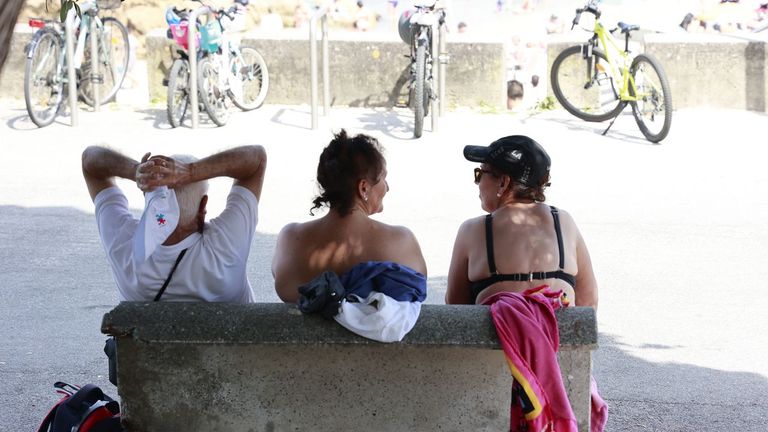 Últimas horas de playa en A Coruña antes de que cambie el tiempo